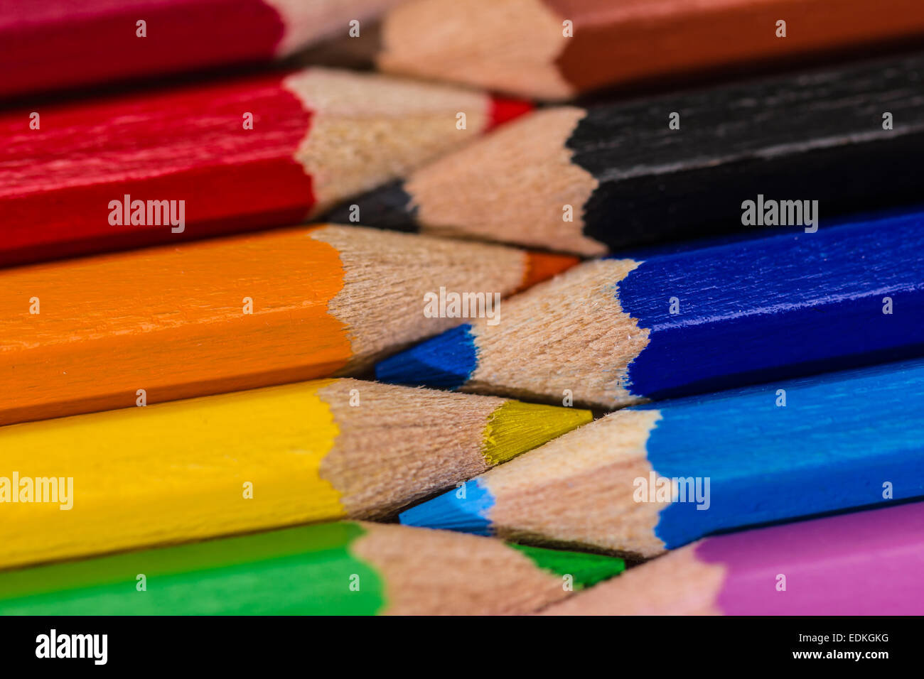 Colorful wooden crayons, pencils Stock Photo - Alamy