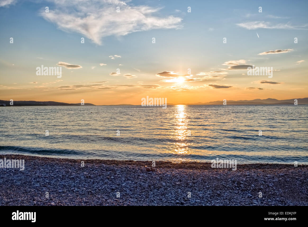 Supetar beach sunset Stock Photo - Alamy