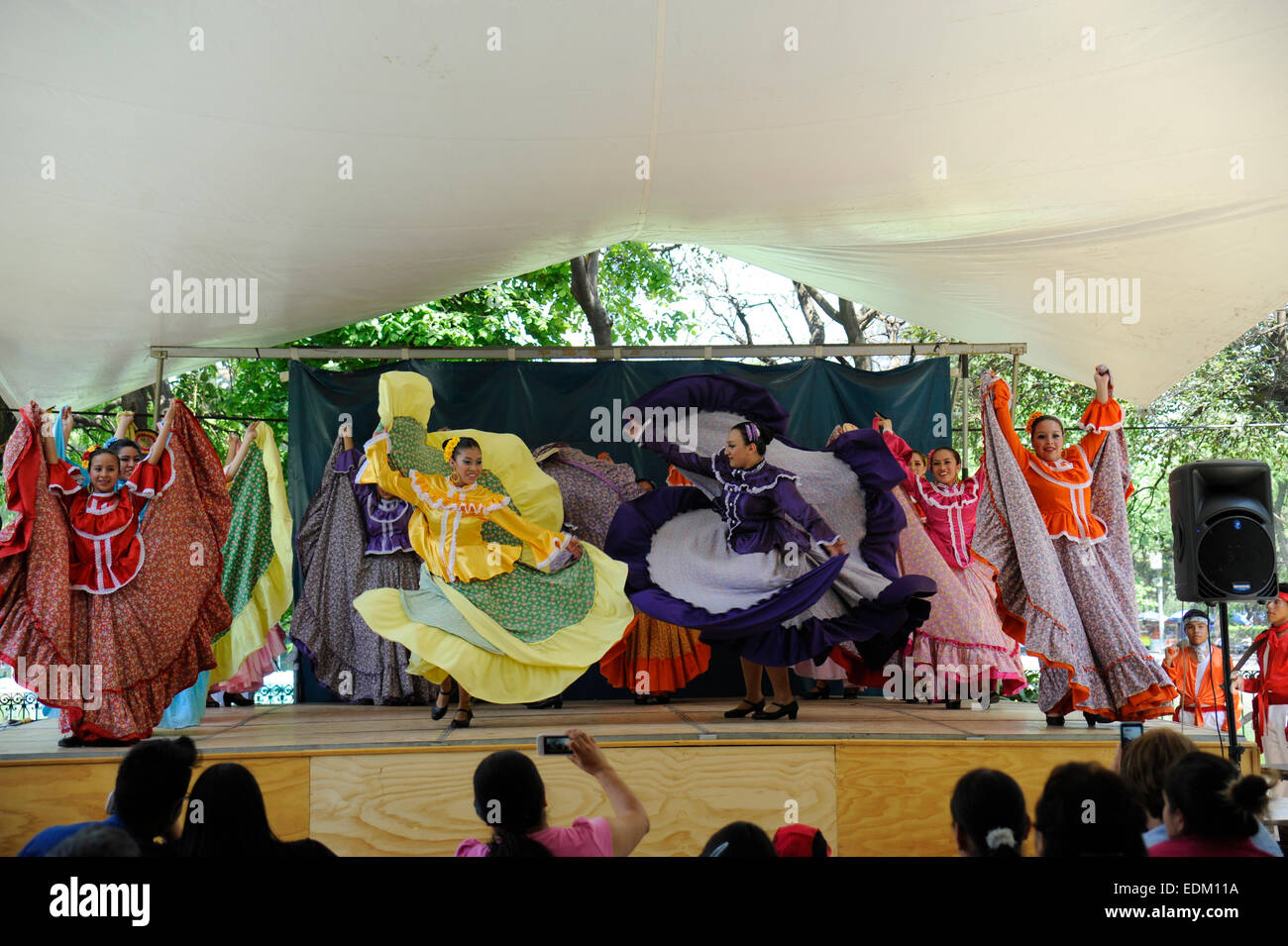 High school dance class exhibition of traditional Mexican dances in ...