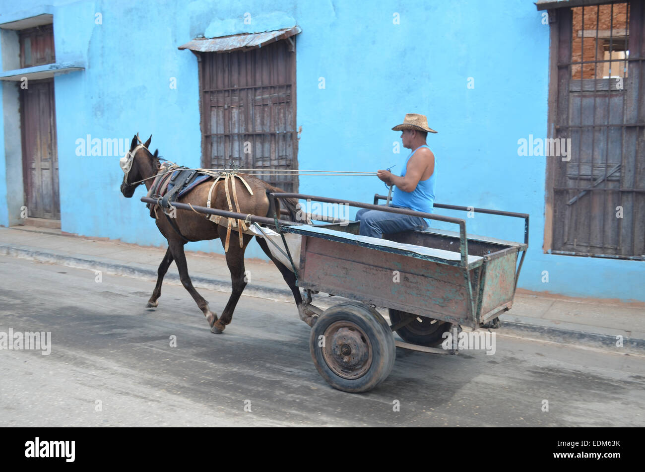 Cuban man on horse drawn cart Stock Photo - Alamy