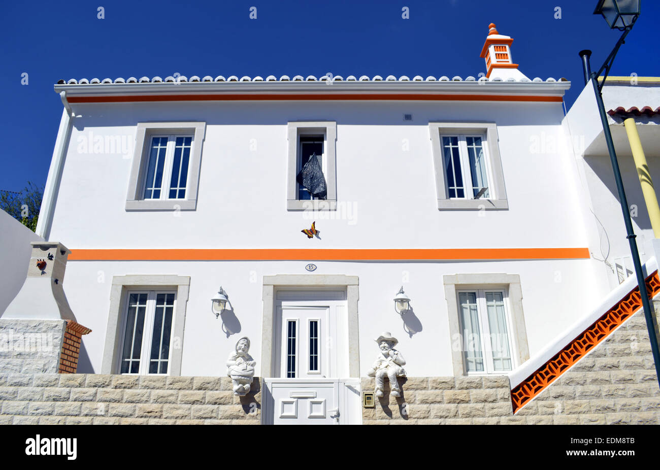 Blue sky with portuguese cottage hi-res stock photography and images ...