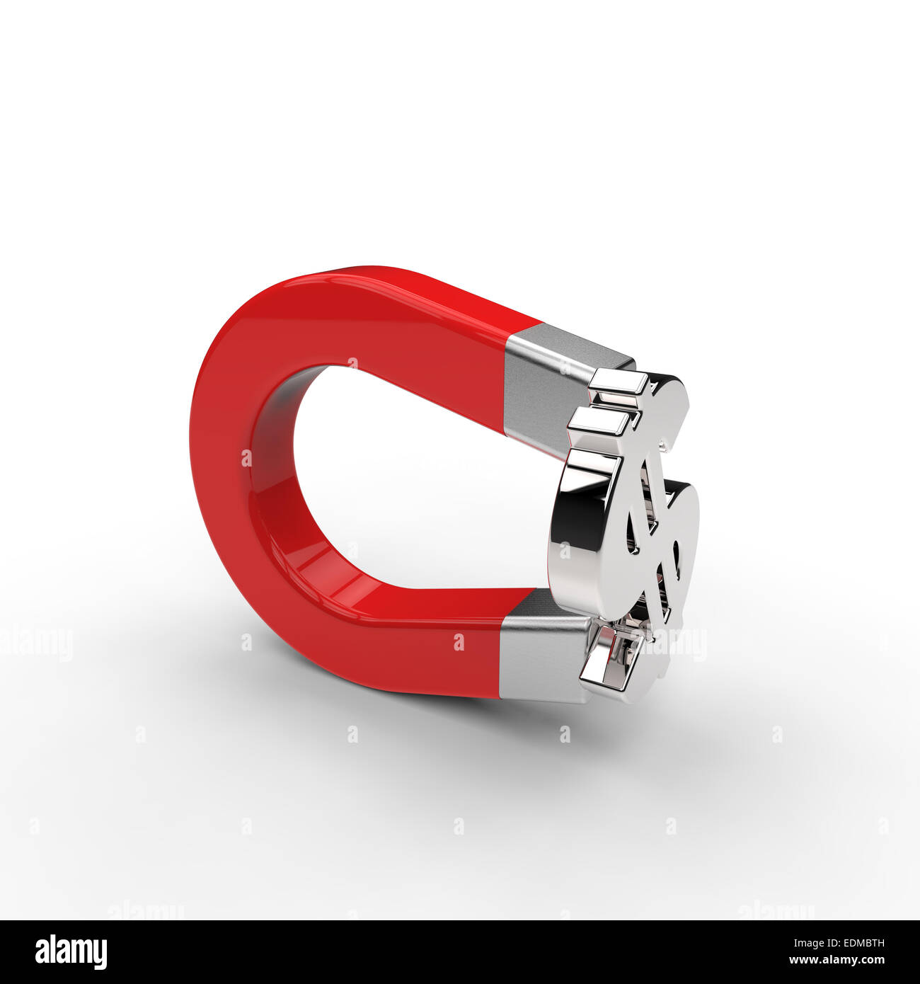 silver dollar attached to a red horseshoe magnet on a white background ...
