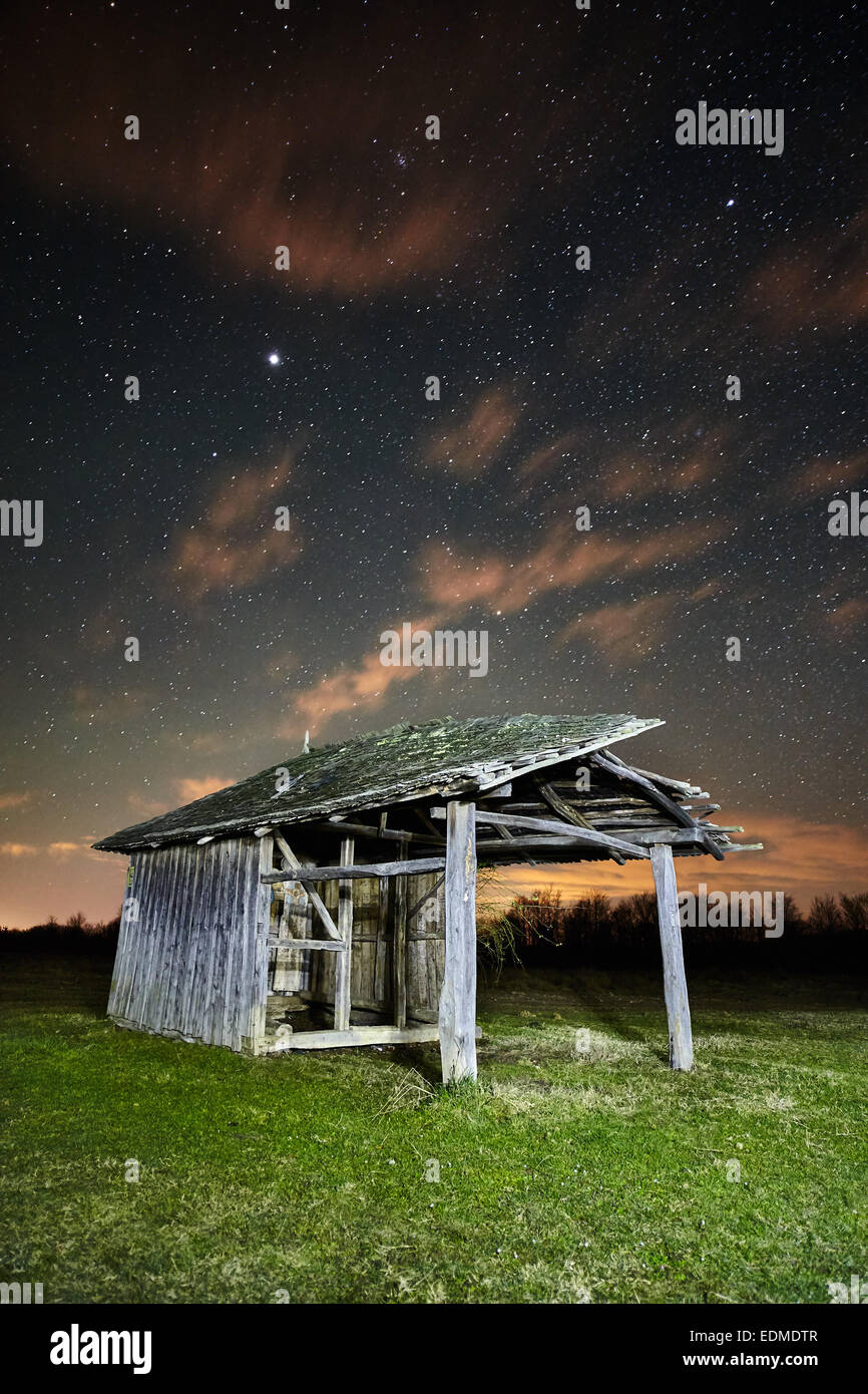 Night landscape with a shed on a meadow Stock Photo - Alamy
