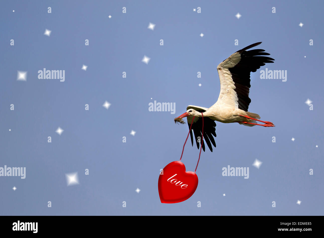 White stork with red heart Stock Photo - Alamy