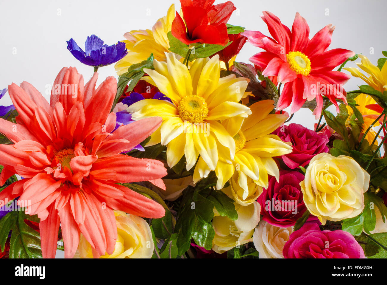 a detail of colorful fabric flowers Stock Photo - Alamy