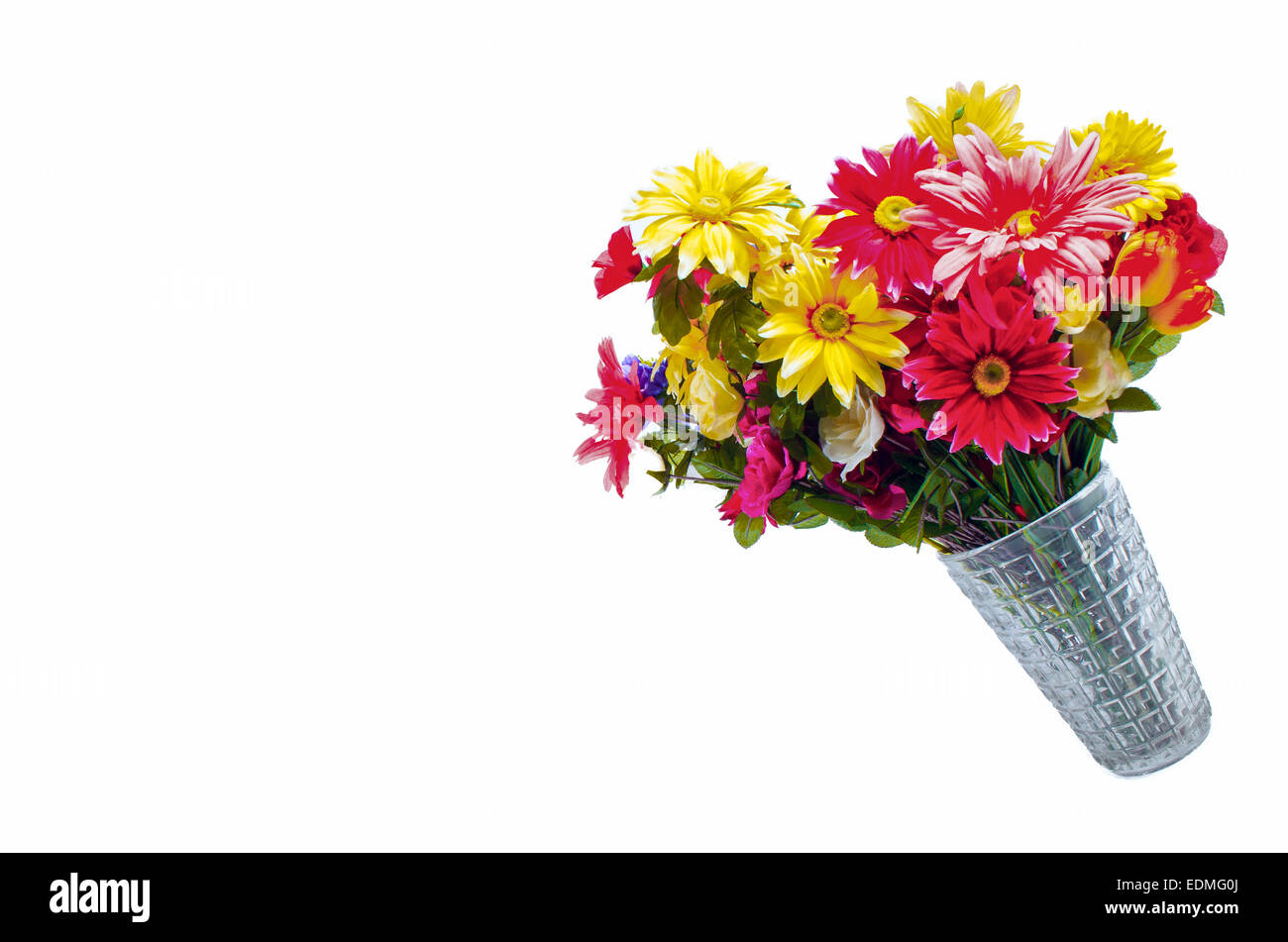 vase with colorful flowers fall over Stock Photo - Alamy
