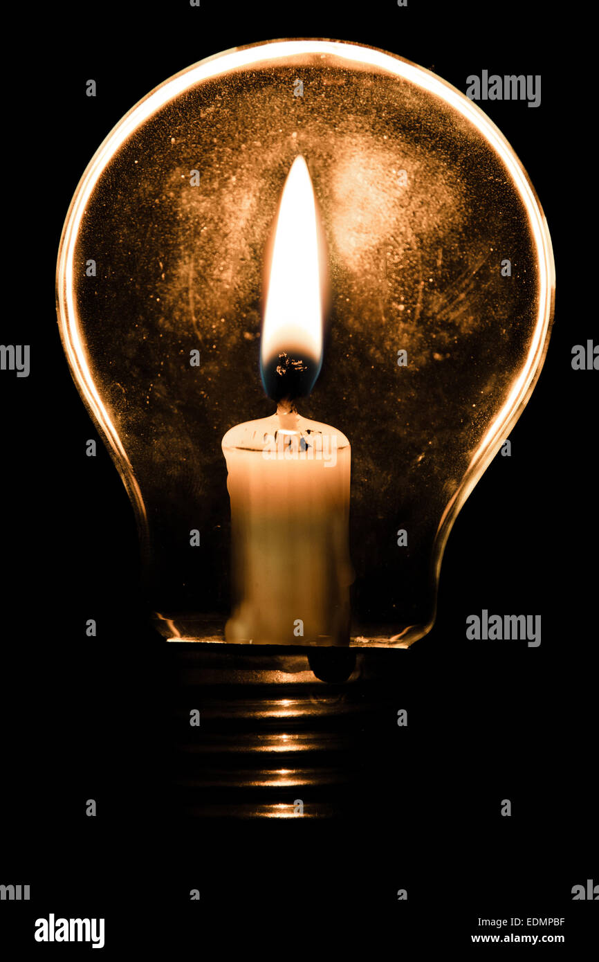 A candle inside a light bulb Stock Photo - Alamy