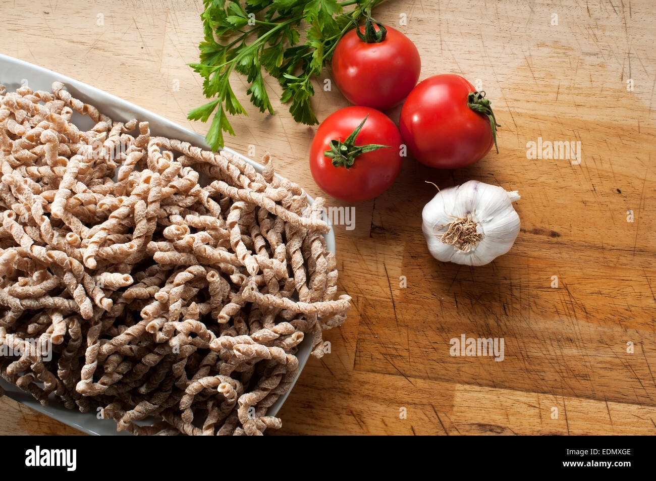 corkscrew shaped raw pasta called busiate with whole wheat flour of ...