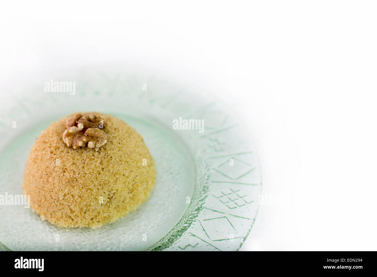 Traditional Turkish semolina sweet desert halva with nuts Stock Photo ...