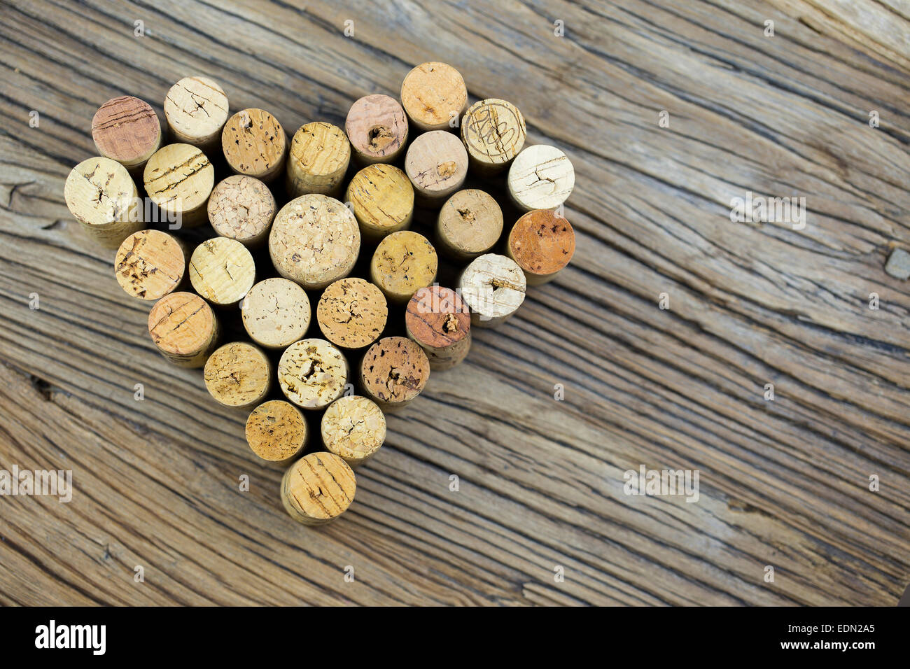 Wine corks form a heart shape image on the wood board background Stock ...