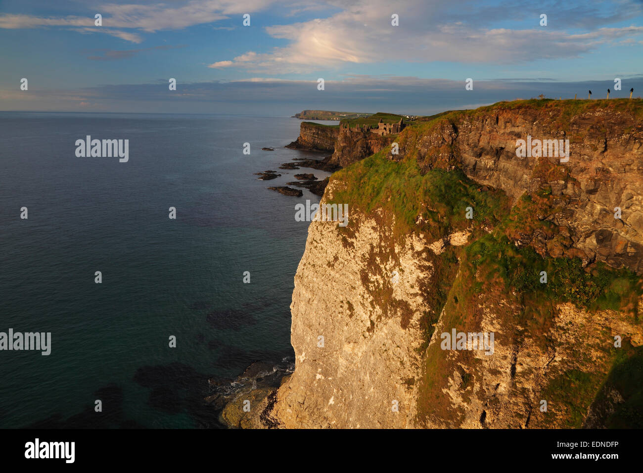Dunluce Castle (Dunclue Castle) in sunset light, Antrim, Northern ...