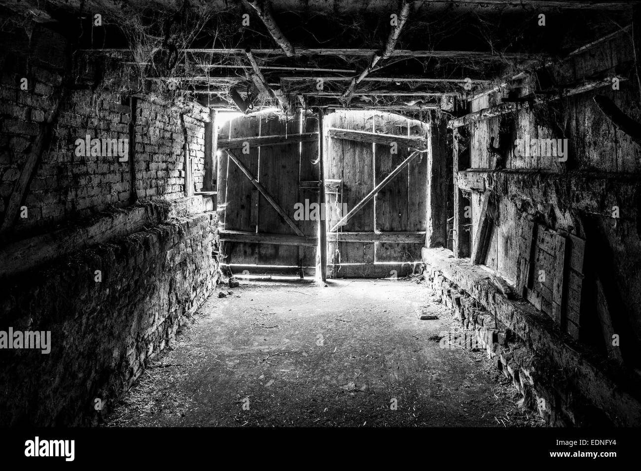 Gate in an old barn Stock Photo - Alamy