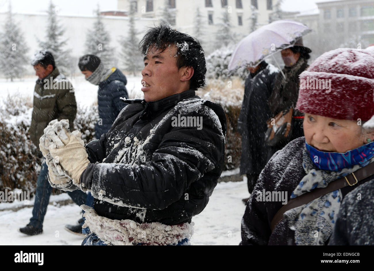 Lhasa, China's Tibet Autonomous Region. 8th Jan, 2015. People walk on a ...