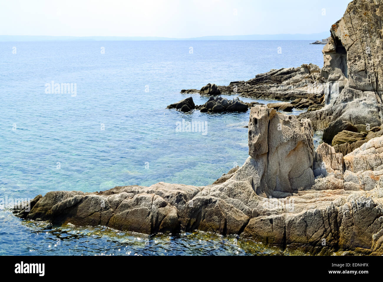 Rocks on sea shore view hi-res stock photography and images - Alamy