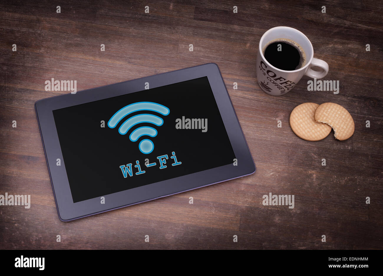 Tablet with Wi-Fi connection on a wooden desk,vintage setting Stock ...