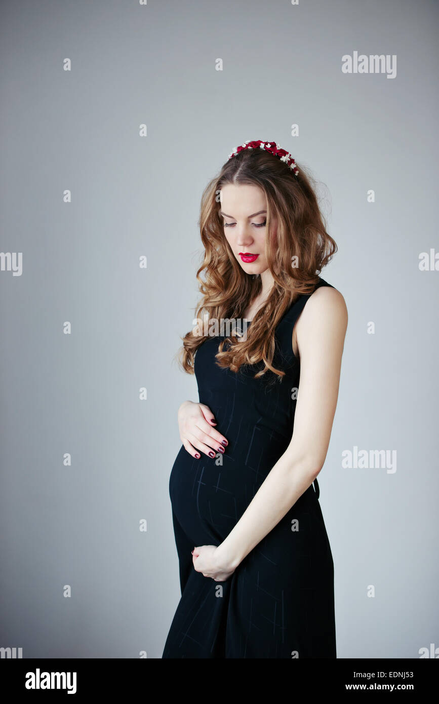 alone beautiful pregnant woman at home portrait Stock Photo - Alamy