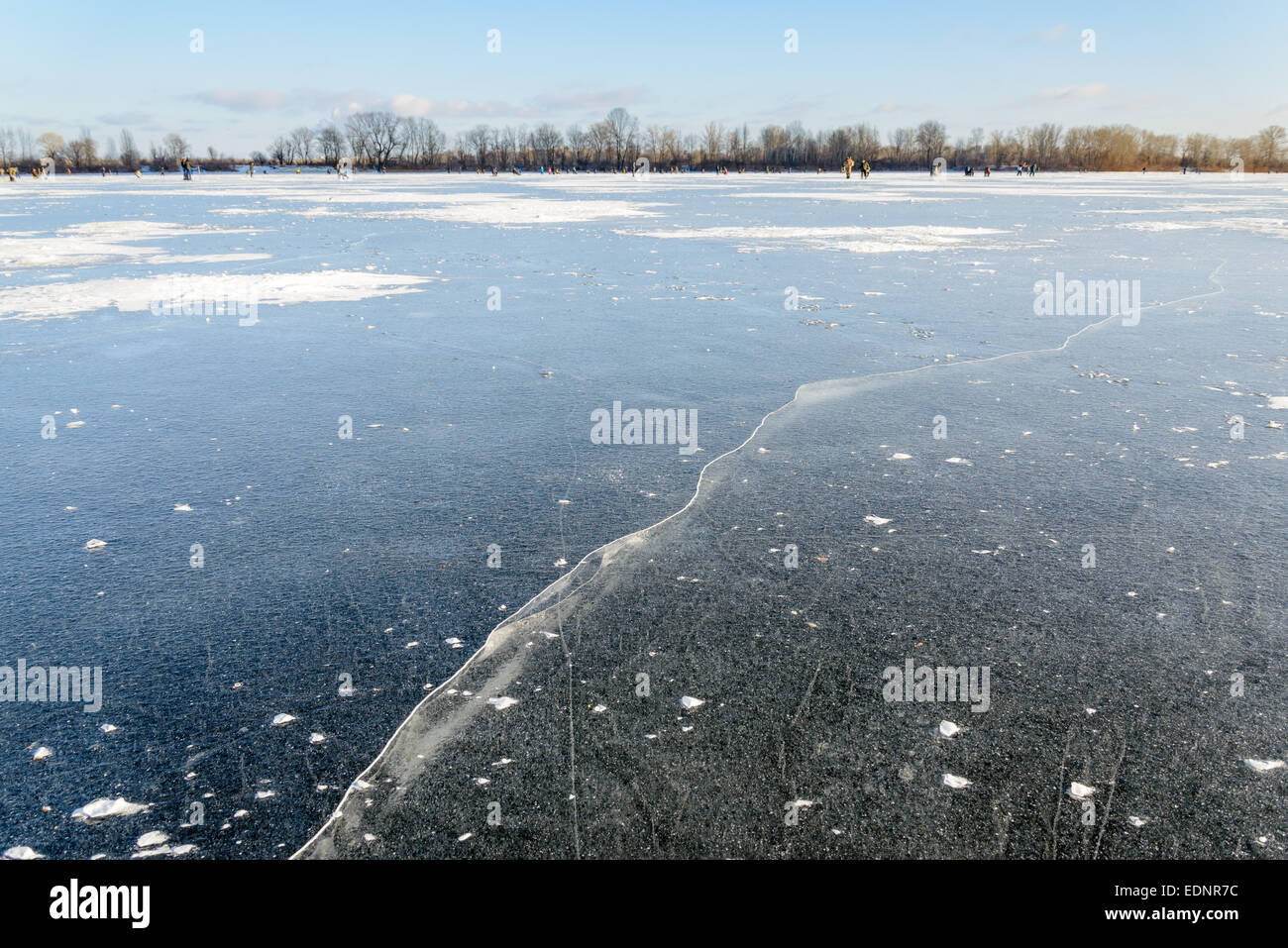 Kiev/Ukraine - January 07, 2015 -The Dnieper river is frozen. Fishermen ...