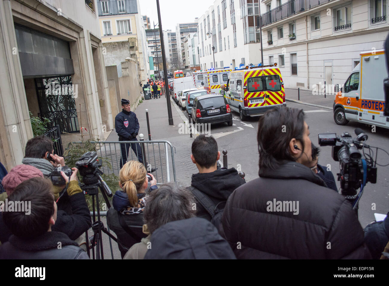 Paris, France. 07th Jan, 2015. Crowd forms as police block access to ...
