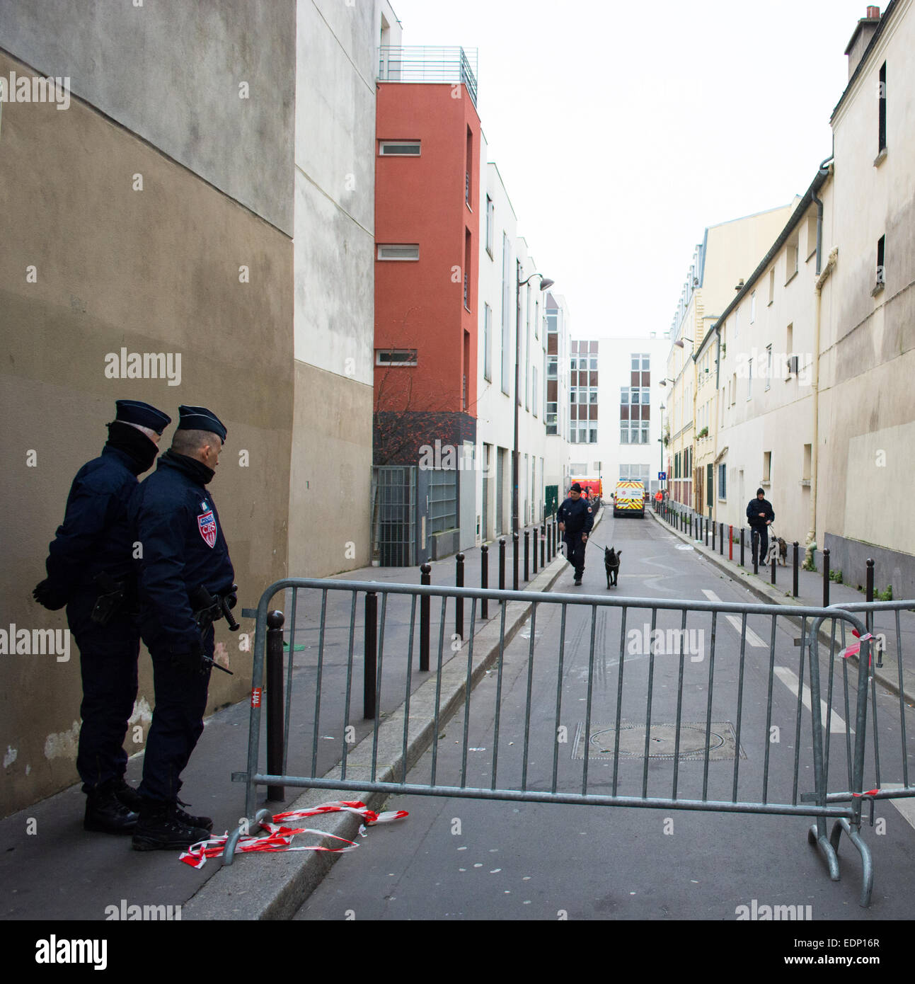 Paris, France. 07th Jan, 2015. Crowd forms as police block access to ...