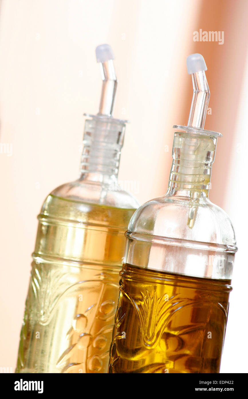 A close up shot of a bottles of cooking oil Stock Photo - Alamy