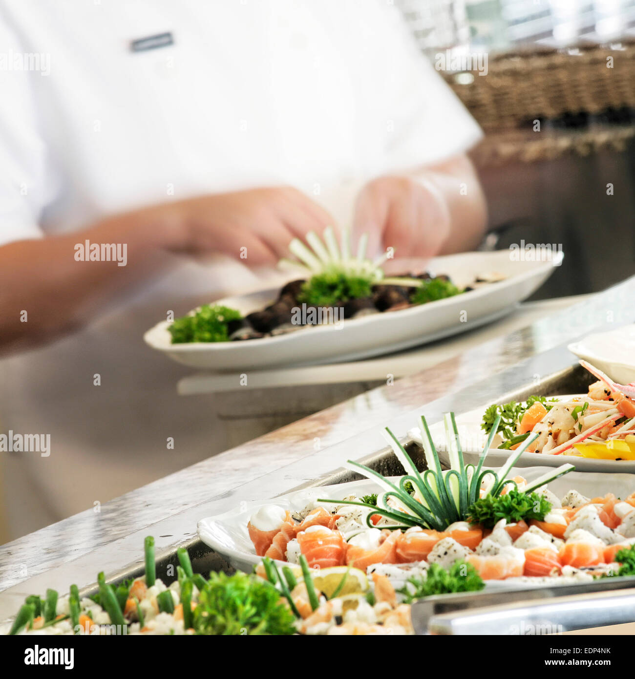A shallow depth of field image looking along a sushi buffet bar Stock ...