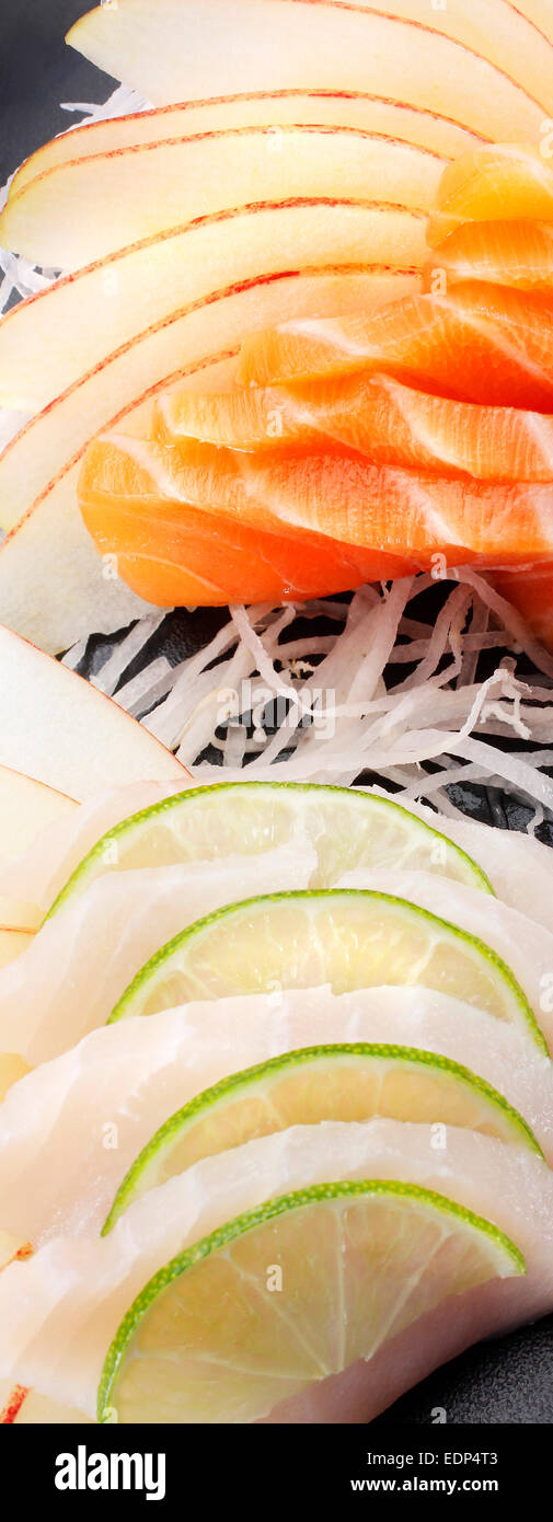 A slim cropped shot from above of raw cod and salmon sushi dish Stock ...