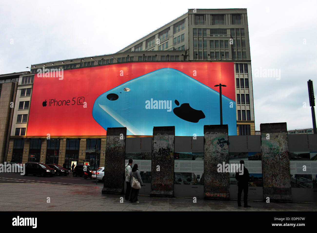 Iphone 5 banner juxtaposed against remains of the Berlin Wall Stock ...