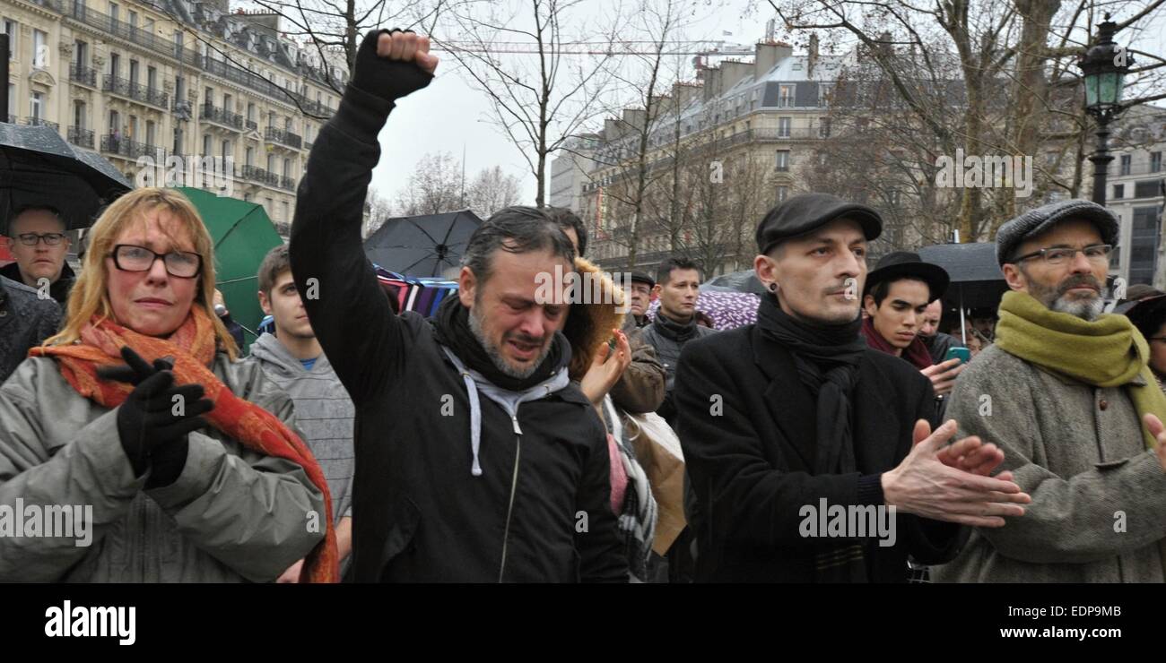 Paris, France. 8th Jan, 2015. People gather at the Place de la ...