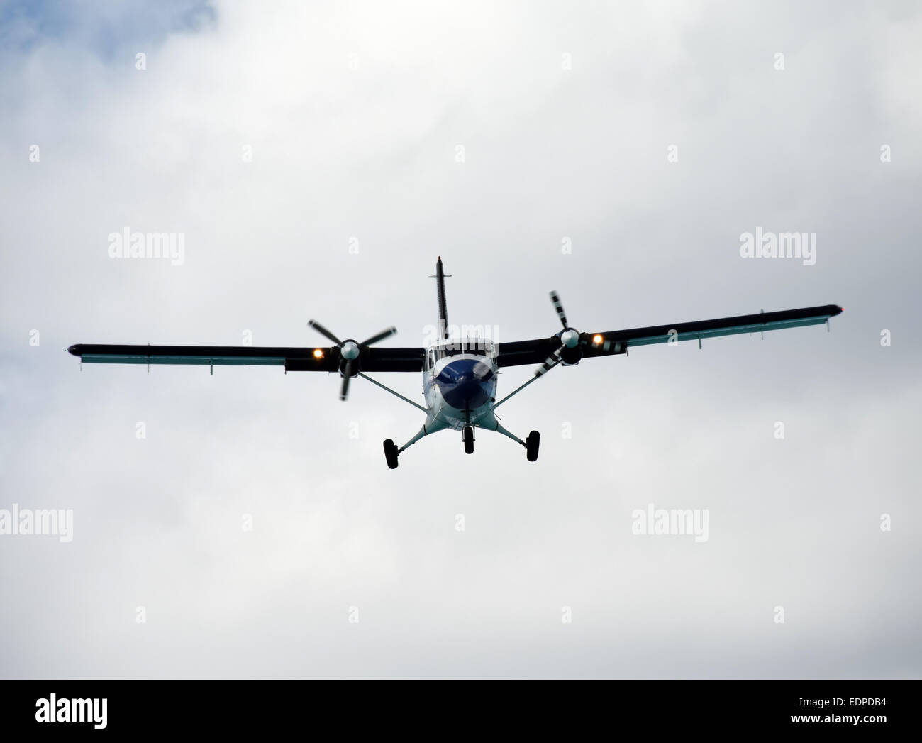 Modern turboprop airplane front view approach for landing Stock Photo ...