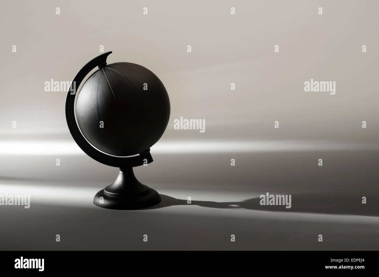 painted black globe earth planet in shadow Stock Photo - Alamy