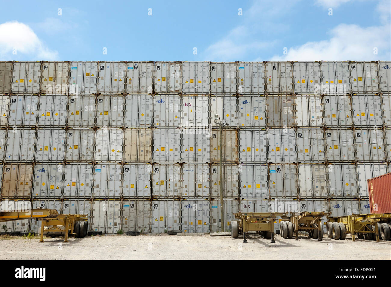 Stacked Containers in Storage Depot Stock Photo - Alamy