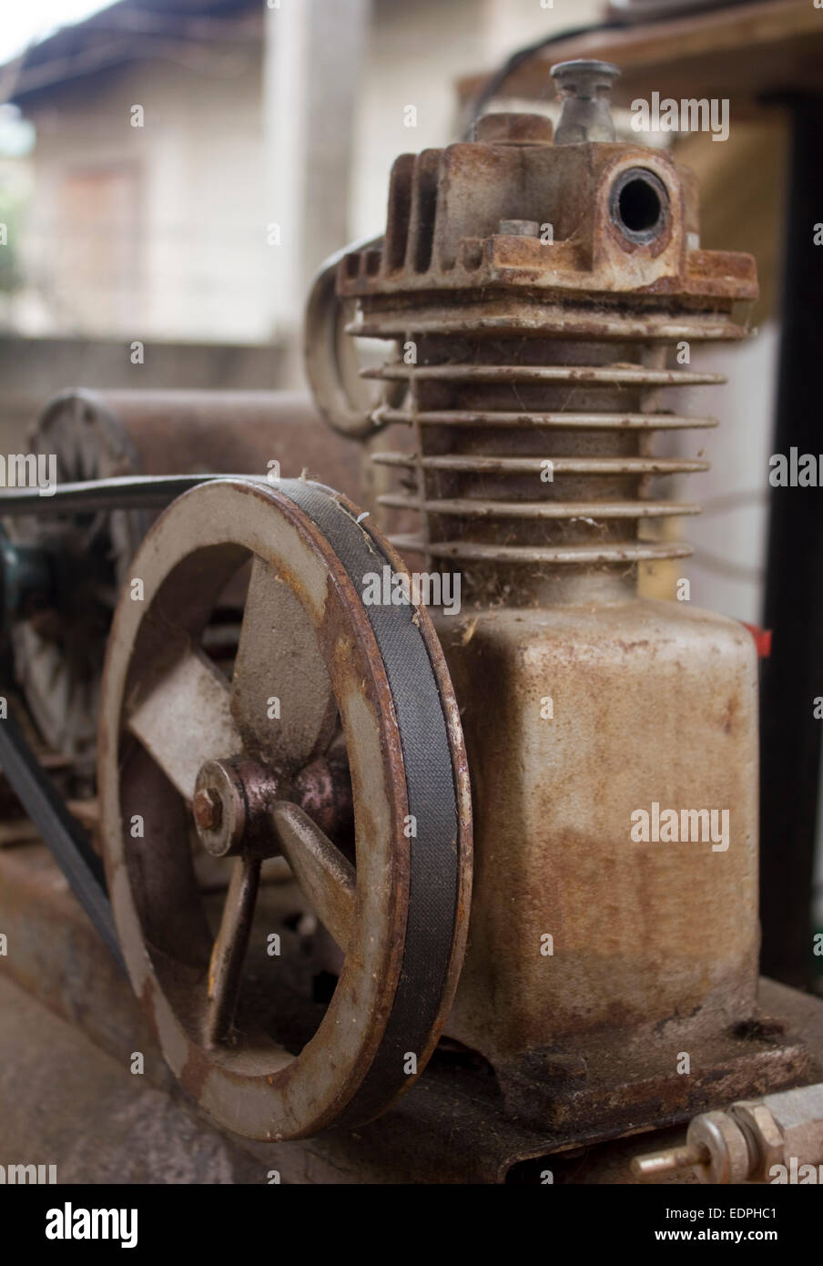 Rusty air compressor (belt drive Stock Photo - Alamy