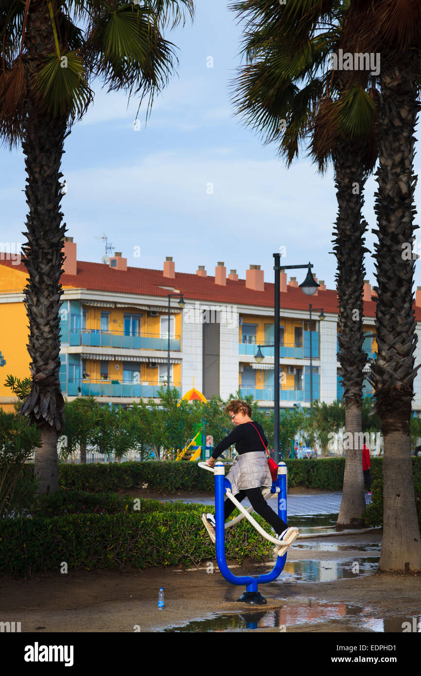 Woman running under trees in hi-res stock photography and images - Alamy