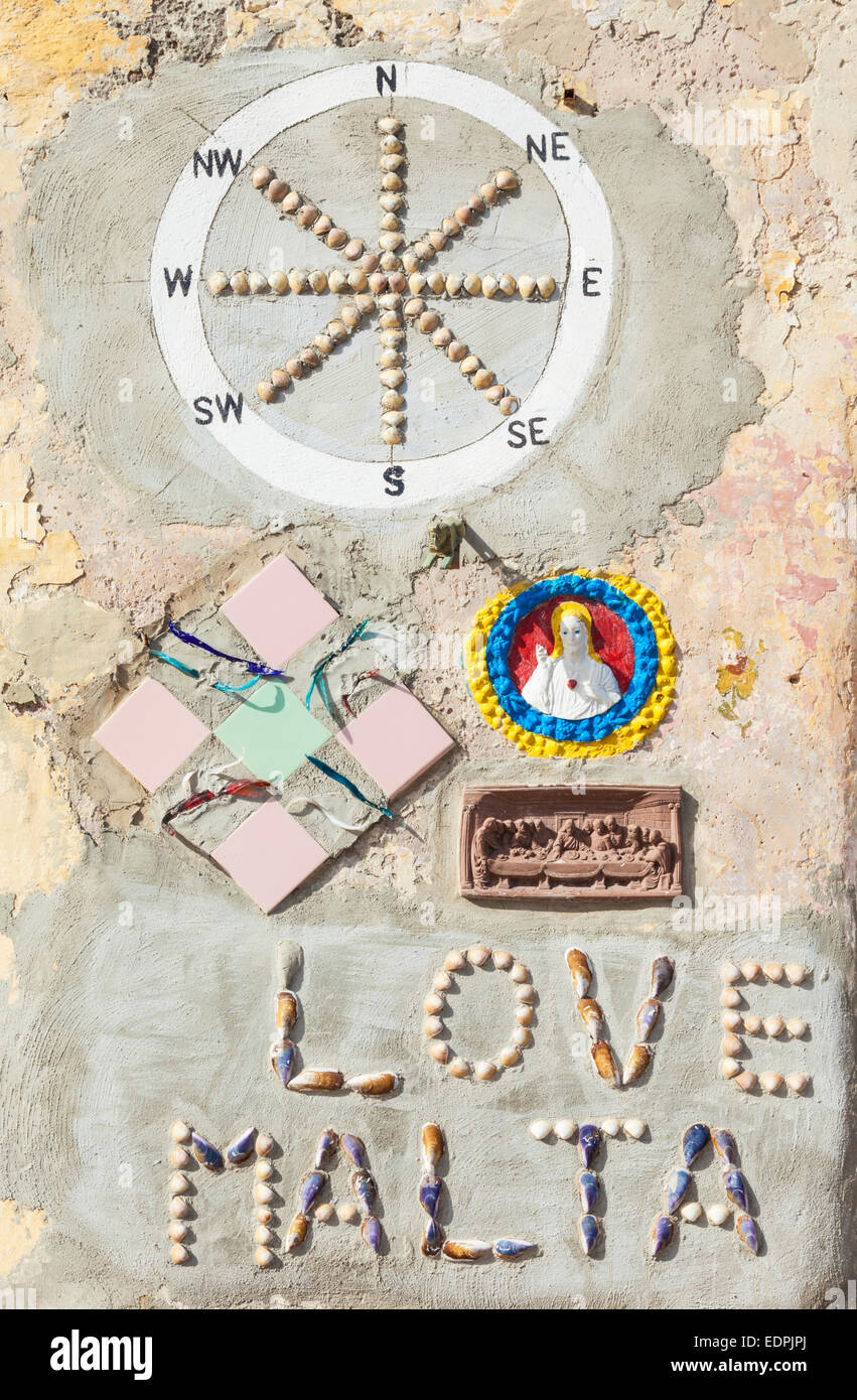Compass rose and Love Malta sign made from shells Marsaxlokk Malta EU ...