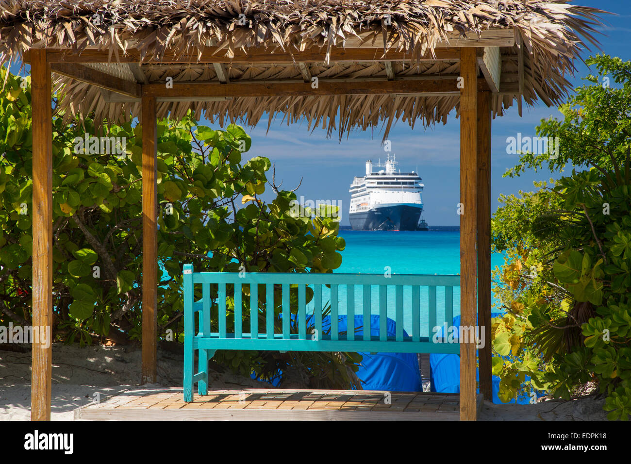 Shady bench seat overlooking turquoise waters of Half Moon Cay and ...