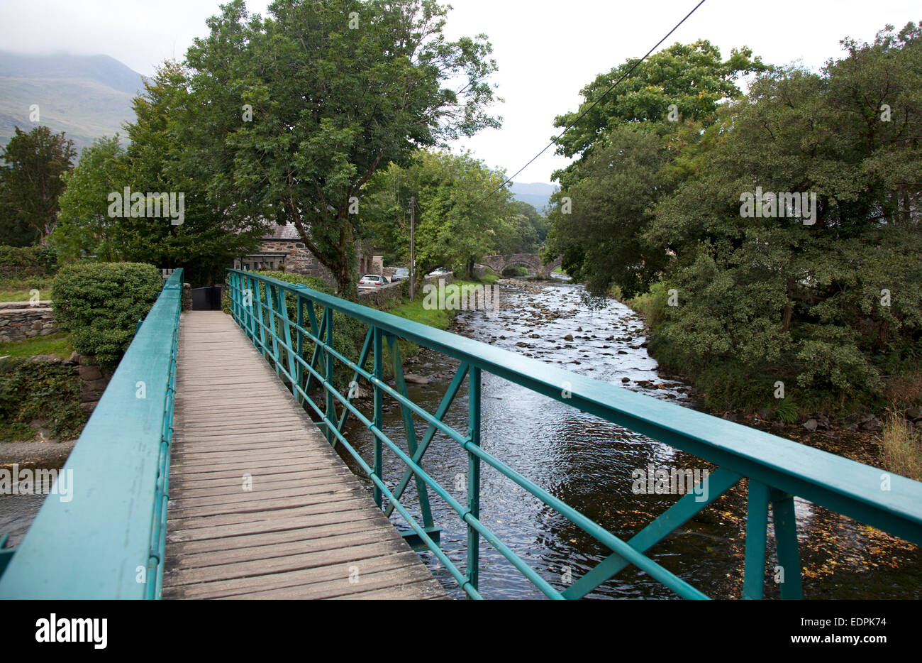 The footbridge at the confluence of the Rivers Glaslyn and Colwyn in ...