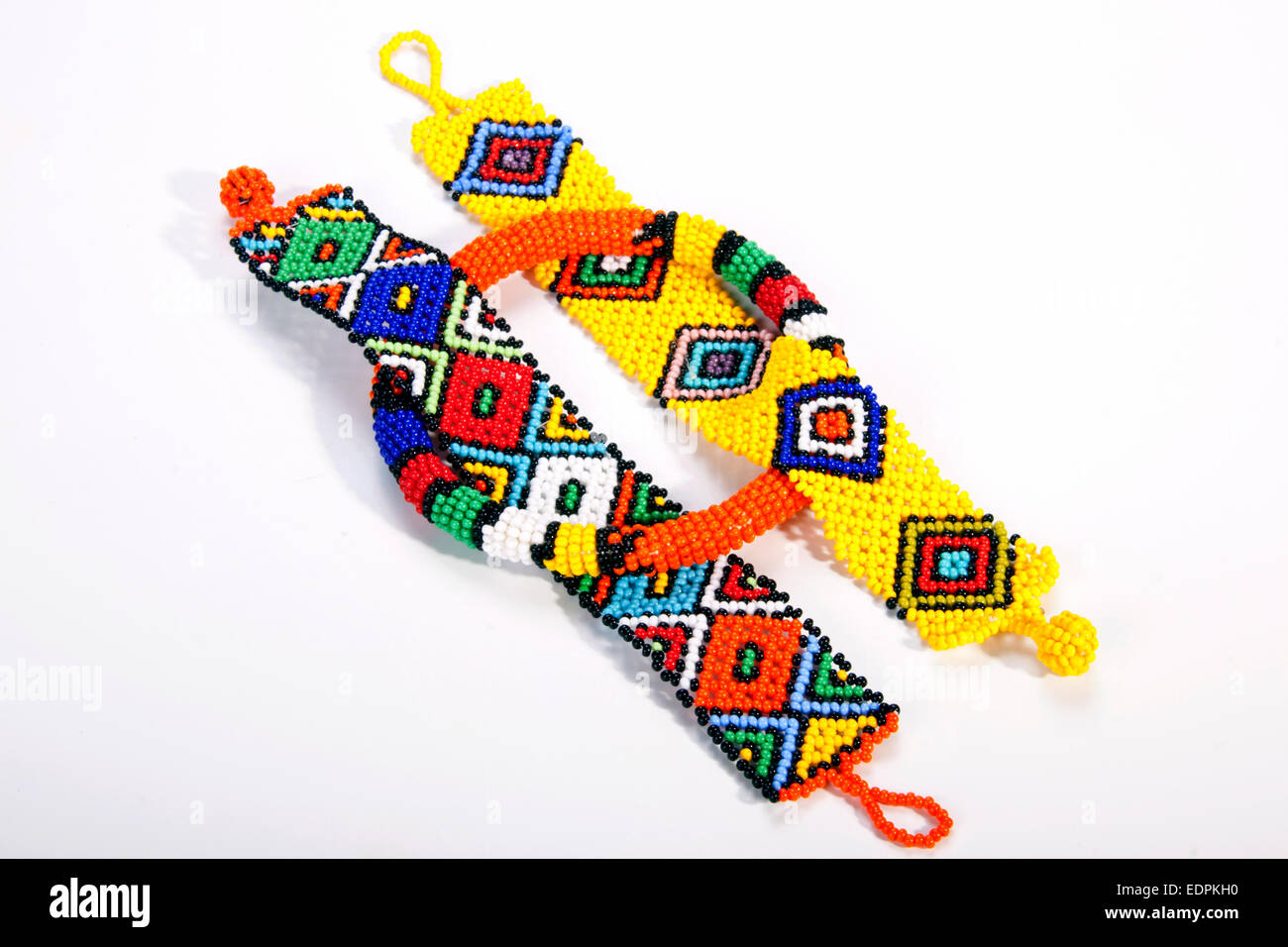 three pieces of brightly colored beaded Zulu jewelry Stock Photo - Alamy