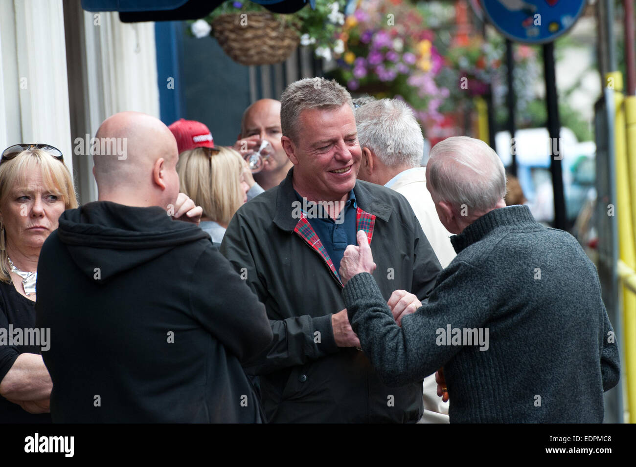 Madness frontman Suggs has a drink in Soho with friends Featuring ...