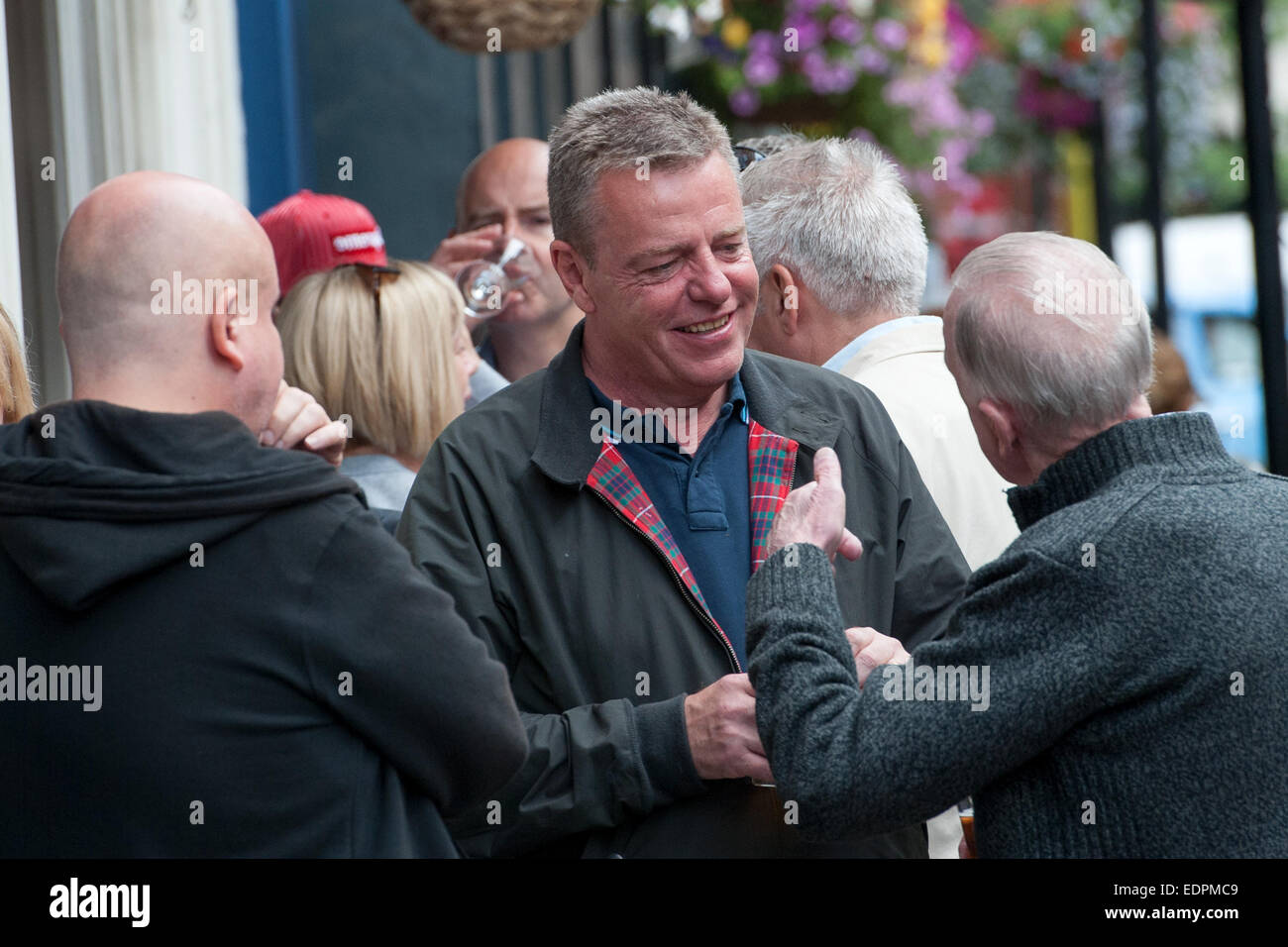 Madness frontman Suggs has a drink in Soho with friends Featuring ...