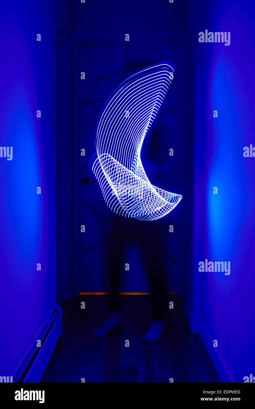 Whimsical light painting forms with LED light stick Stock Photo - Alamy