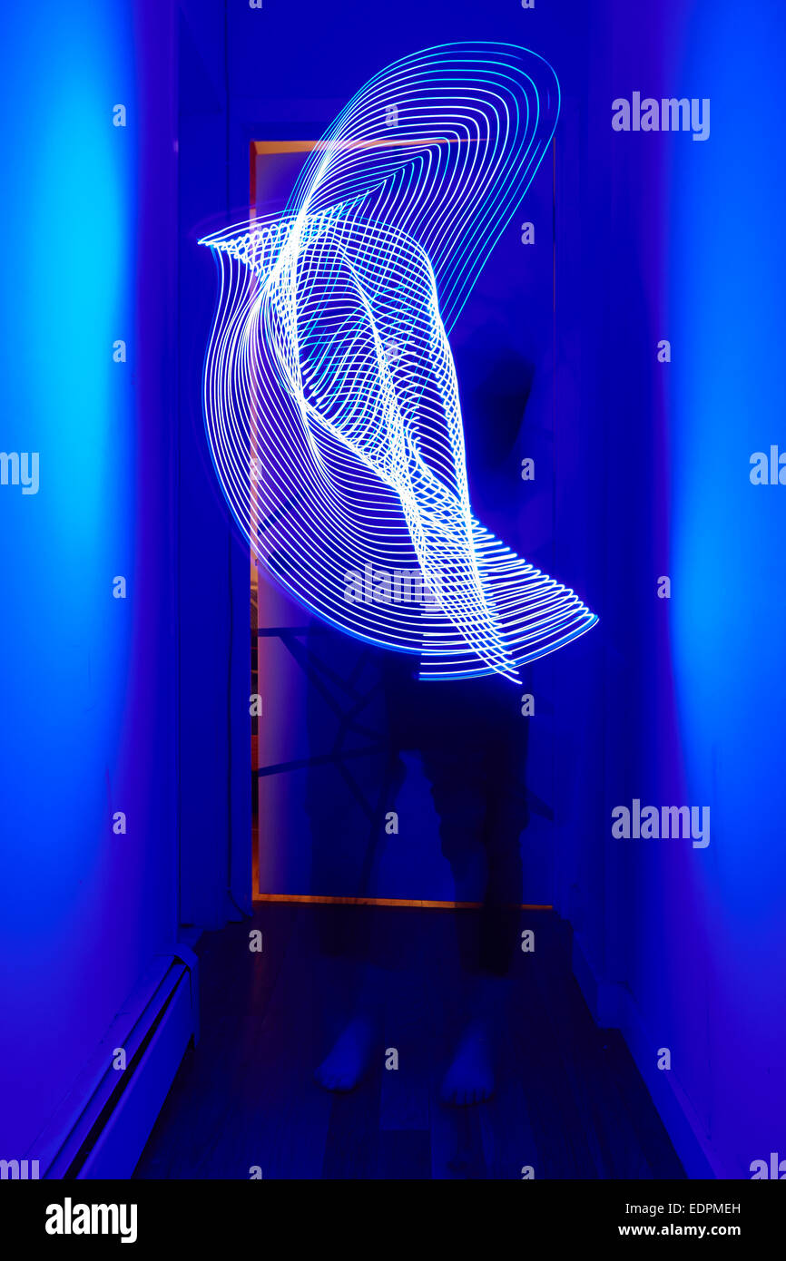 Whimsical light painting forms with LED light stick Stock Photo - Alamy