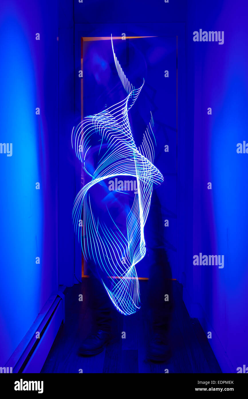 Whimsical light painting forms with LED light stick Stock Photo - Alamy