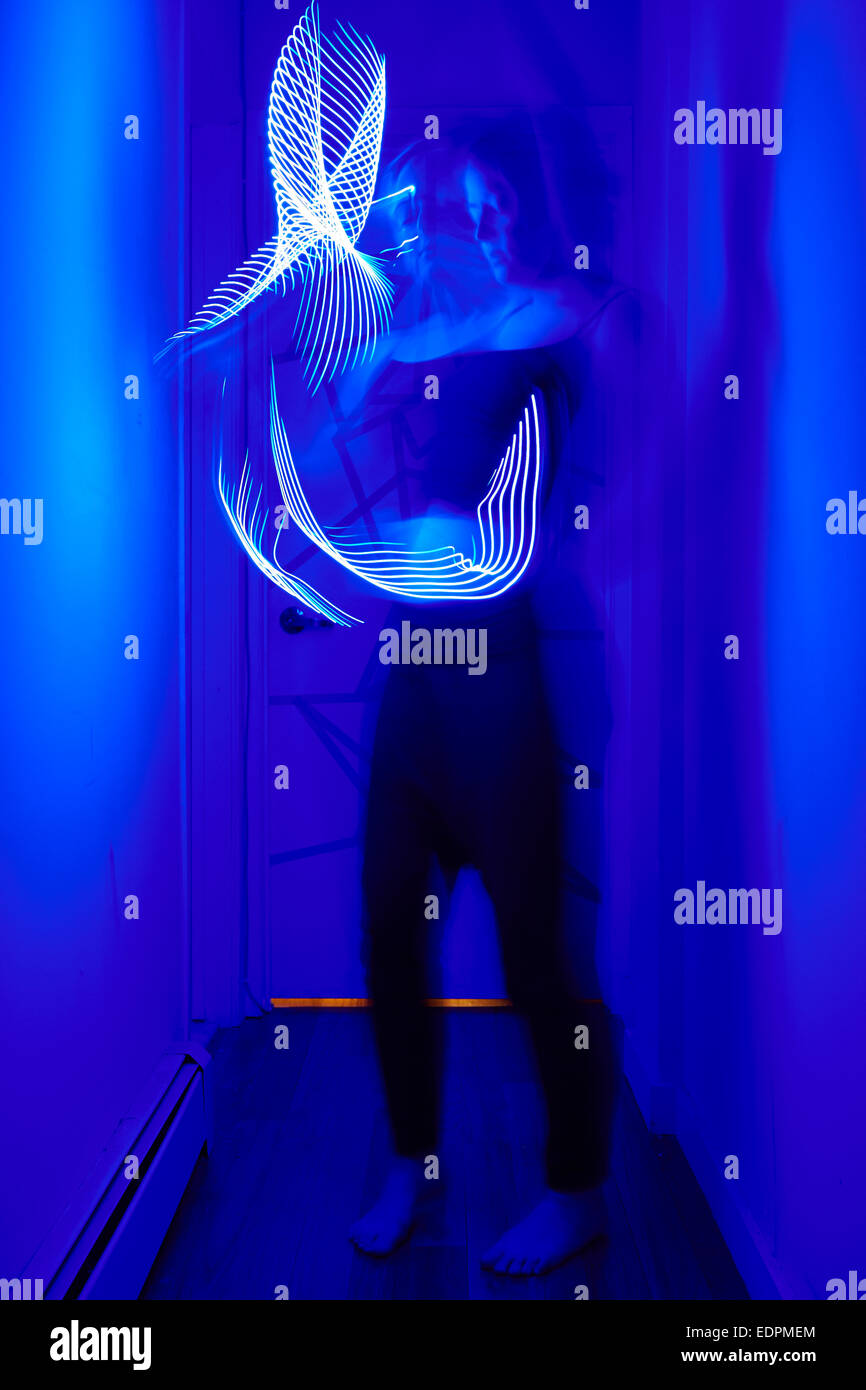 Whimsical light painting forms with LED light stick Stock Photo - Alamy