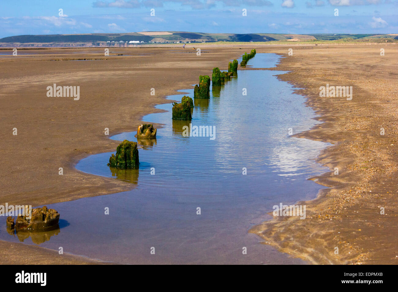 Northam Beach, with Weed Covered Posts in a Pool and Sand Patterns at ...