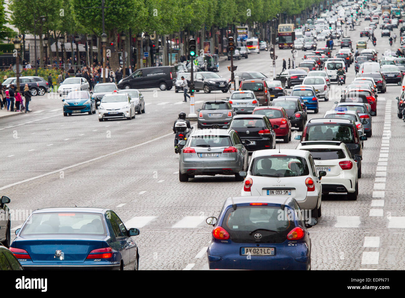 Rush hour on the Elysian fields known as Champs-Élysées, Paris Stock ...
