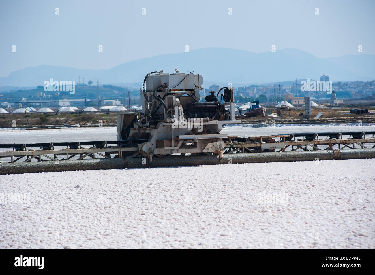 salt collecting in a salt farm Stock Photo - Alamy