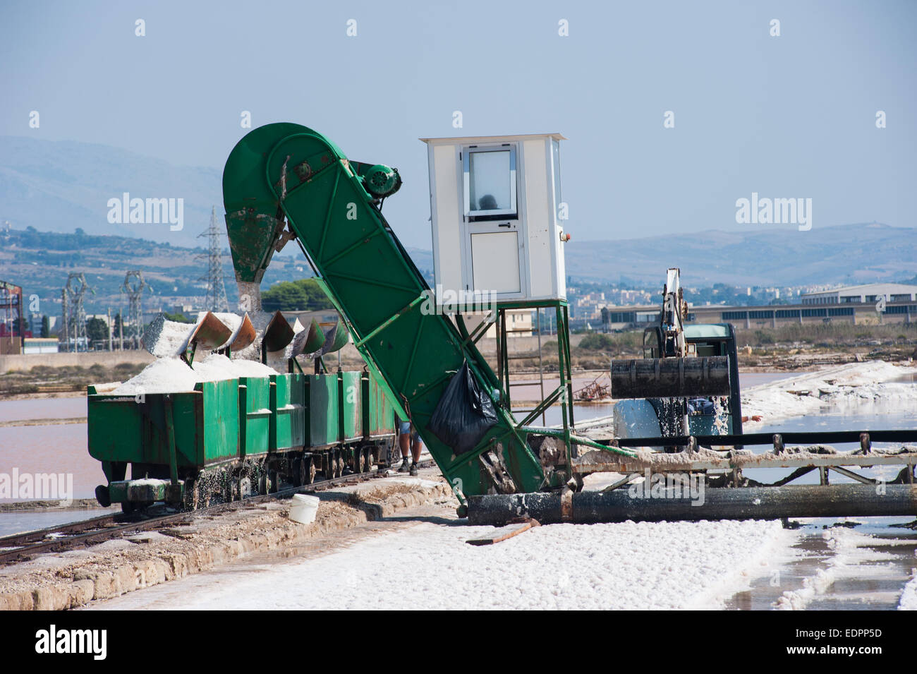 salt collecting in a salt farm Stock Photo - Alamy