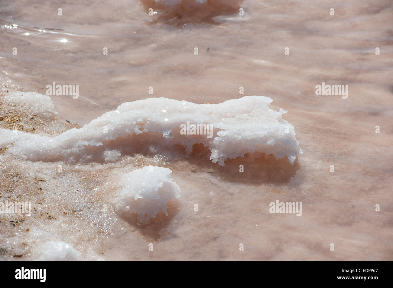 salt collecting in a salt farm Stock Photo - Alamy