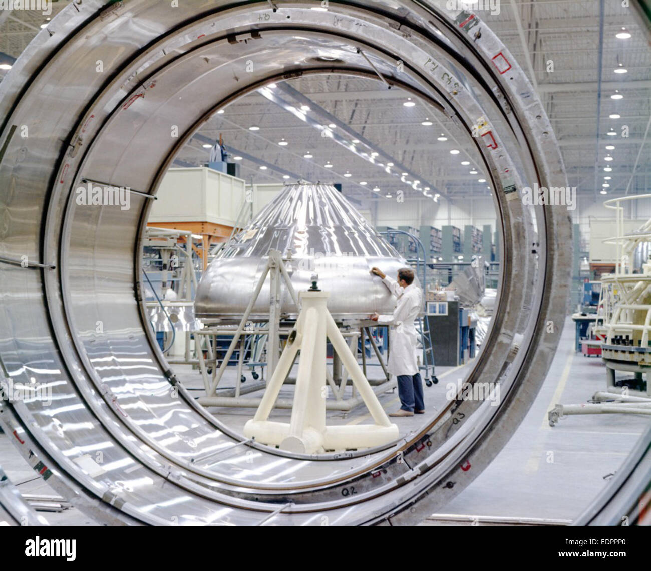 This photograph shows the assembly process of an Atlas missile, taken ...