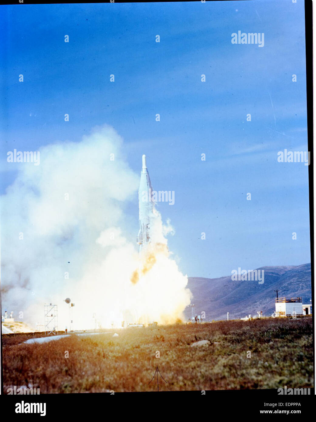 The Atlas ICBM launch, captured in a master negative, features the ...